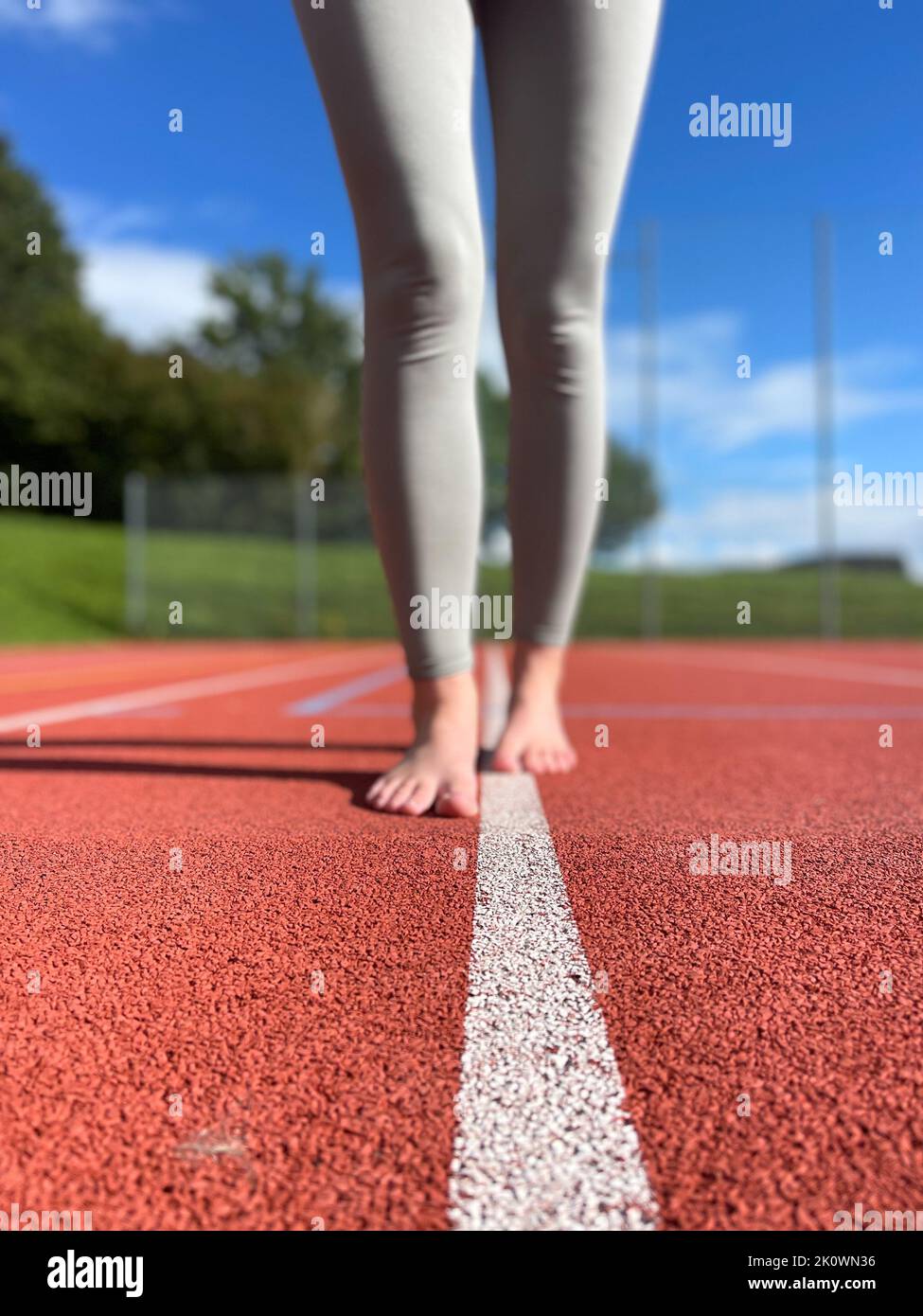 Barefoot on track and field hi-res stock photography and images - Alamy
