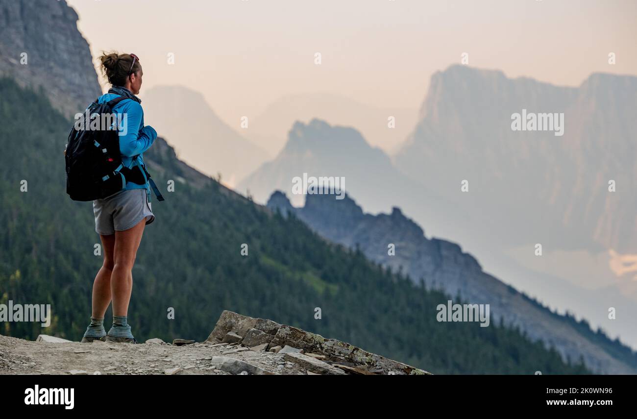 Woman hiker stands edge hi-res stock photography and images - Alamy