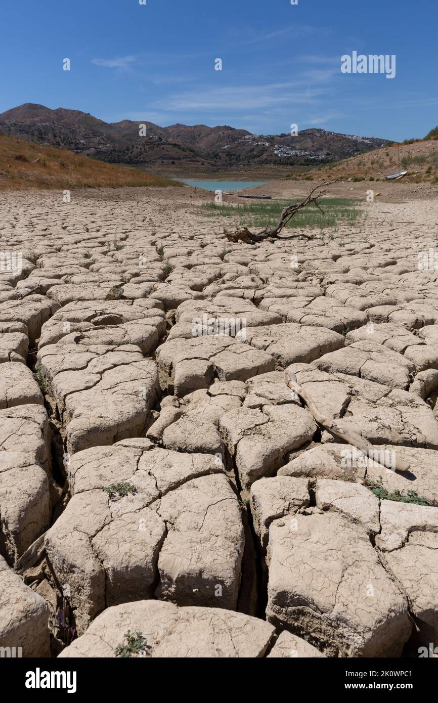 Cracked mud as drought affects Vinuela reservoir in Malaga, Spain Stock ...