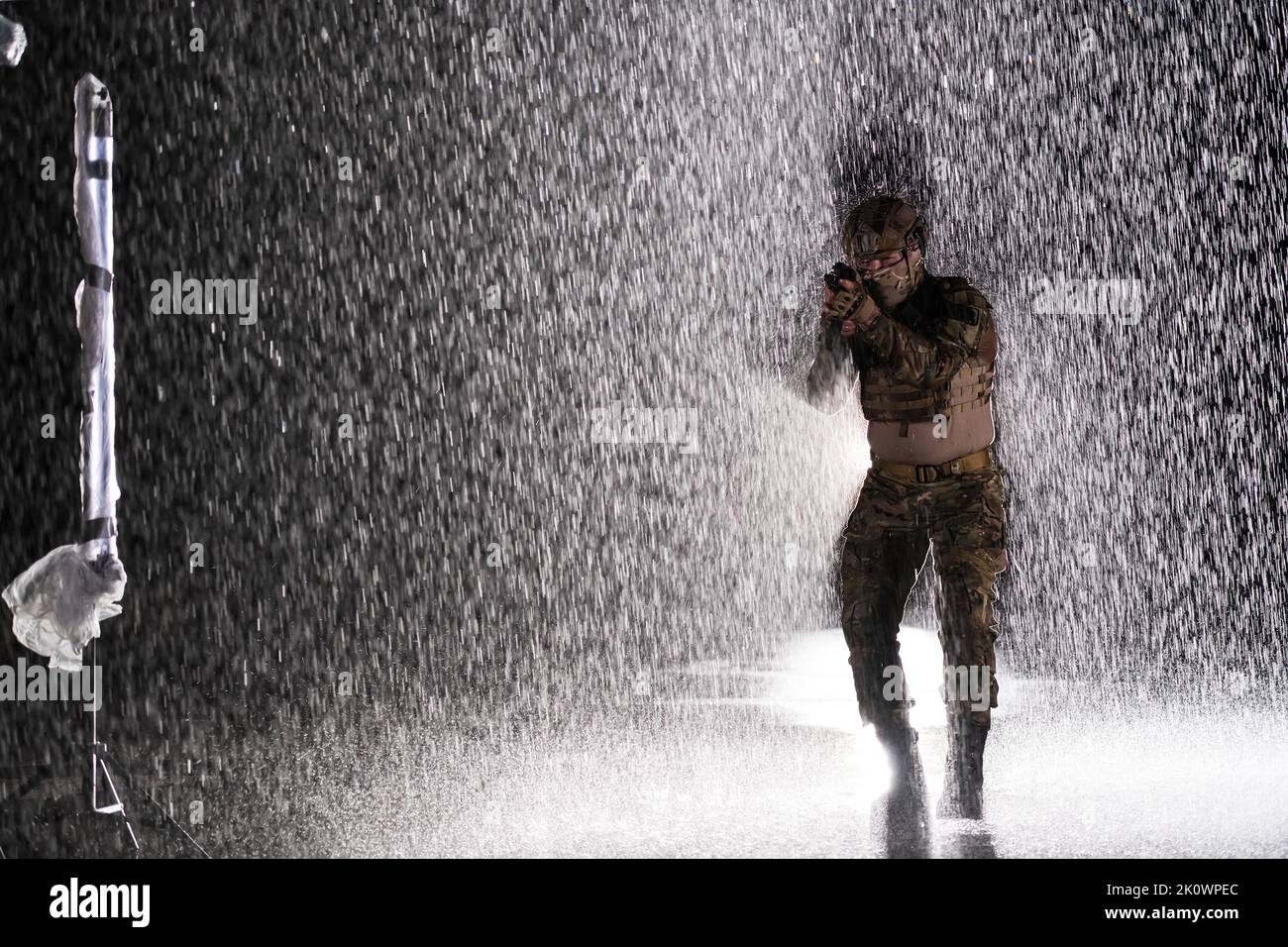 Army soldier in Combat Uniforms with an assault rifle, plate carrier ...