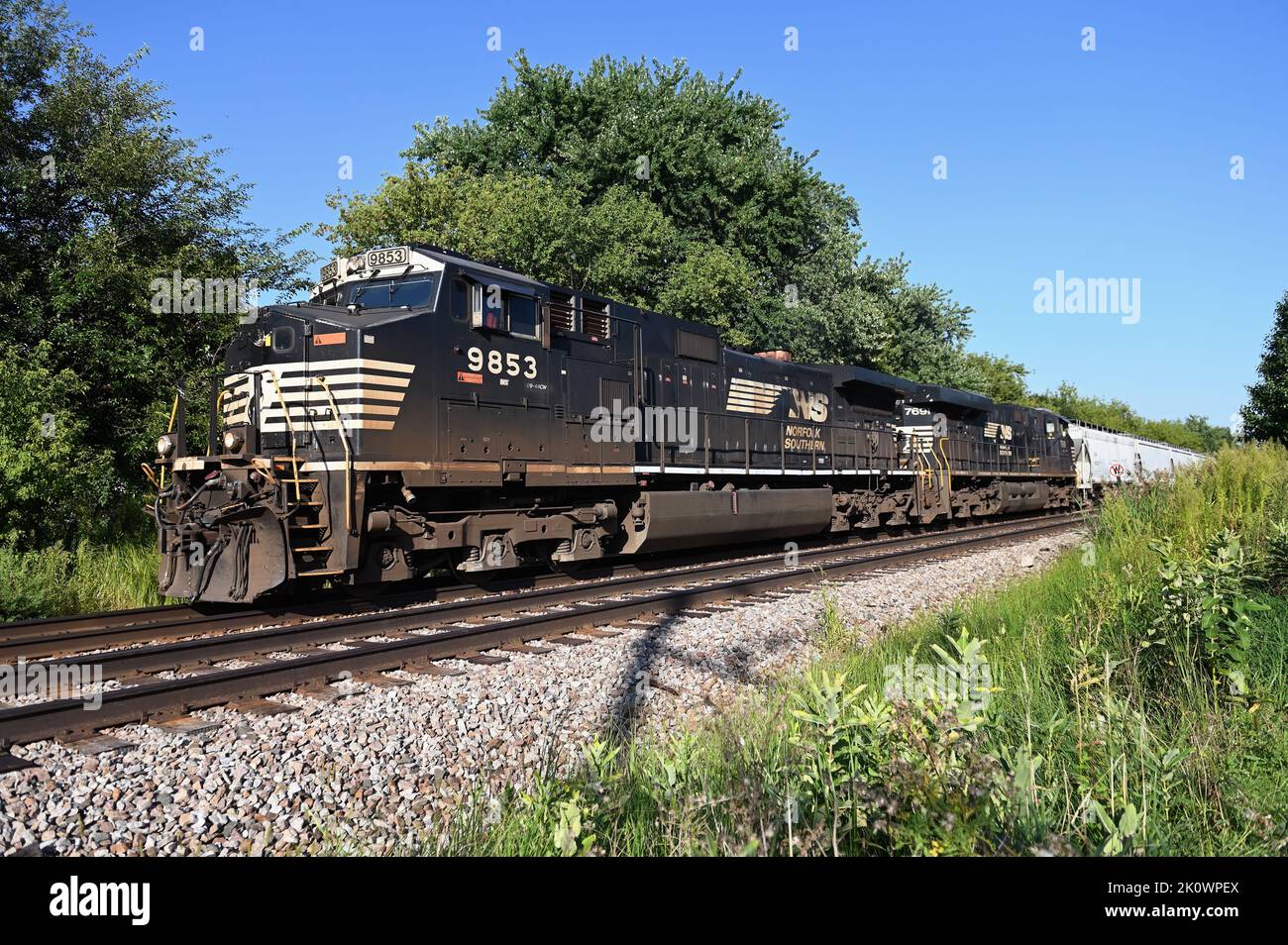 Bartlett, Illinois, USA. Run-through Norfolk Southern Railway locomotives lead a Canadian ...