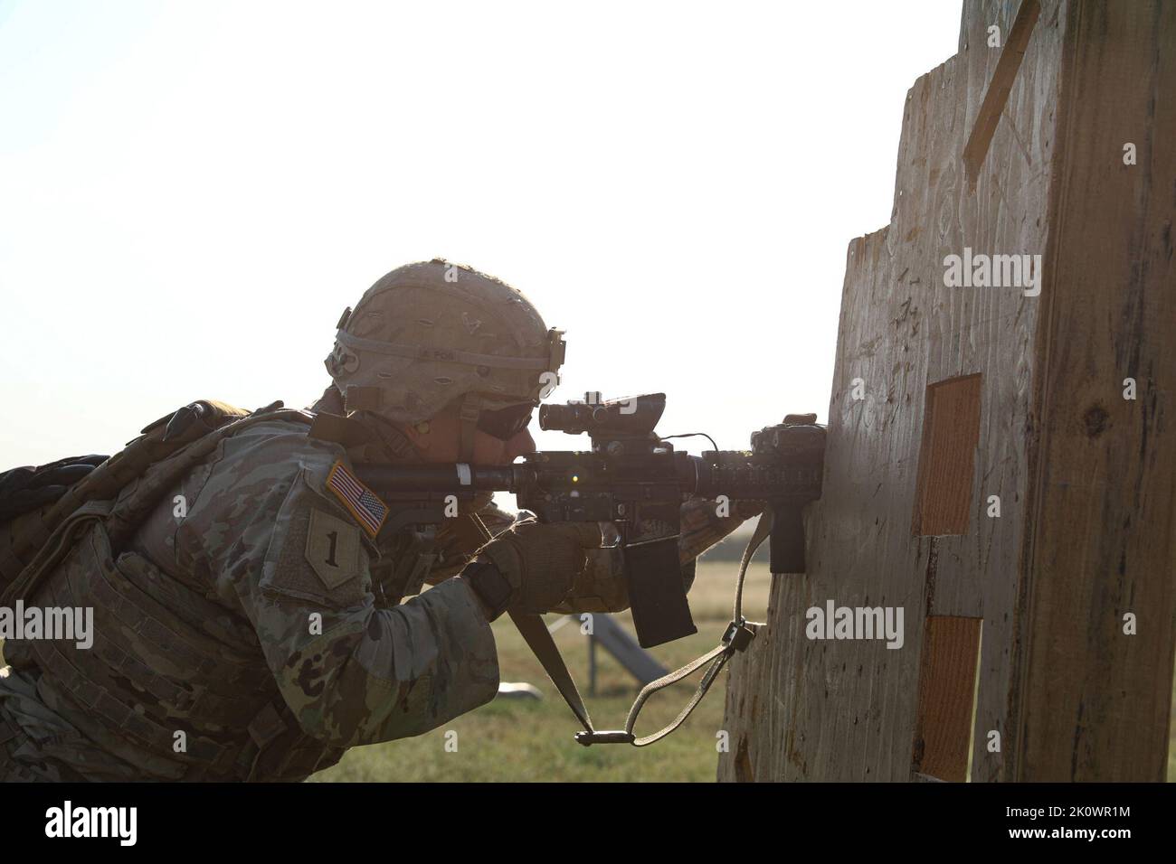 2nd Stryker Brigade Combat Team Soldier shoots a target during the ...