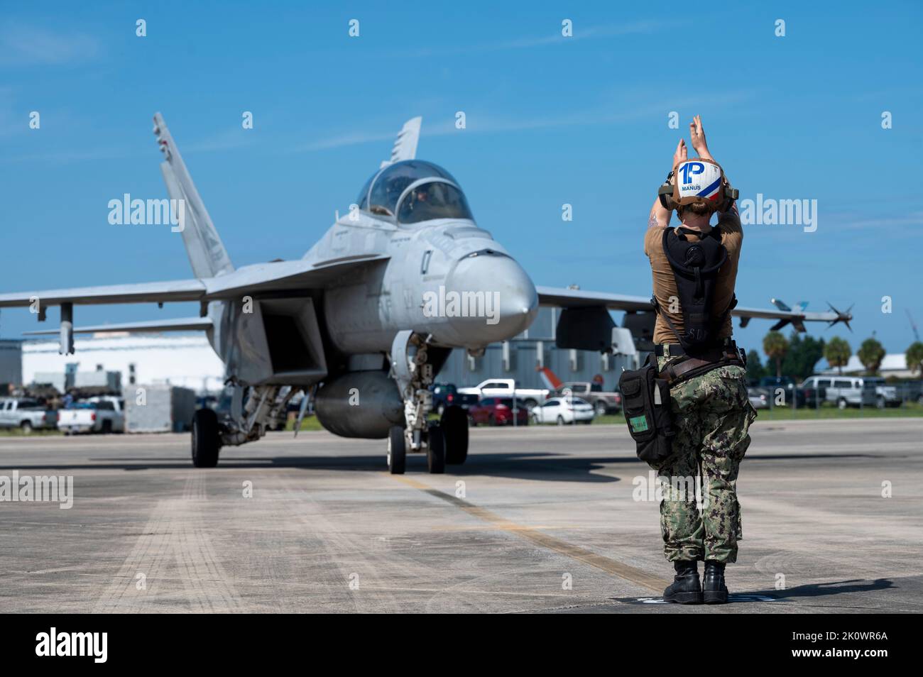 A U.S. Navy Sailor with Strike Fighter Squadron (VFA) 2, Naval Air ...