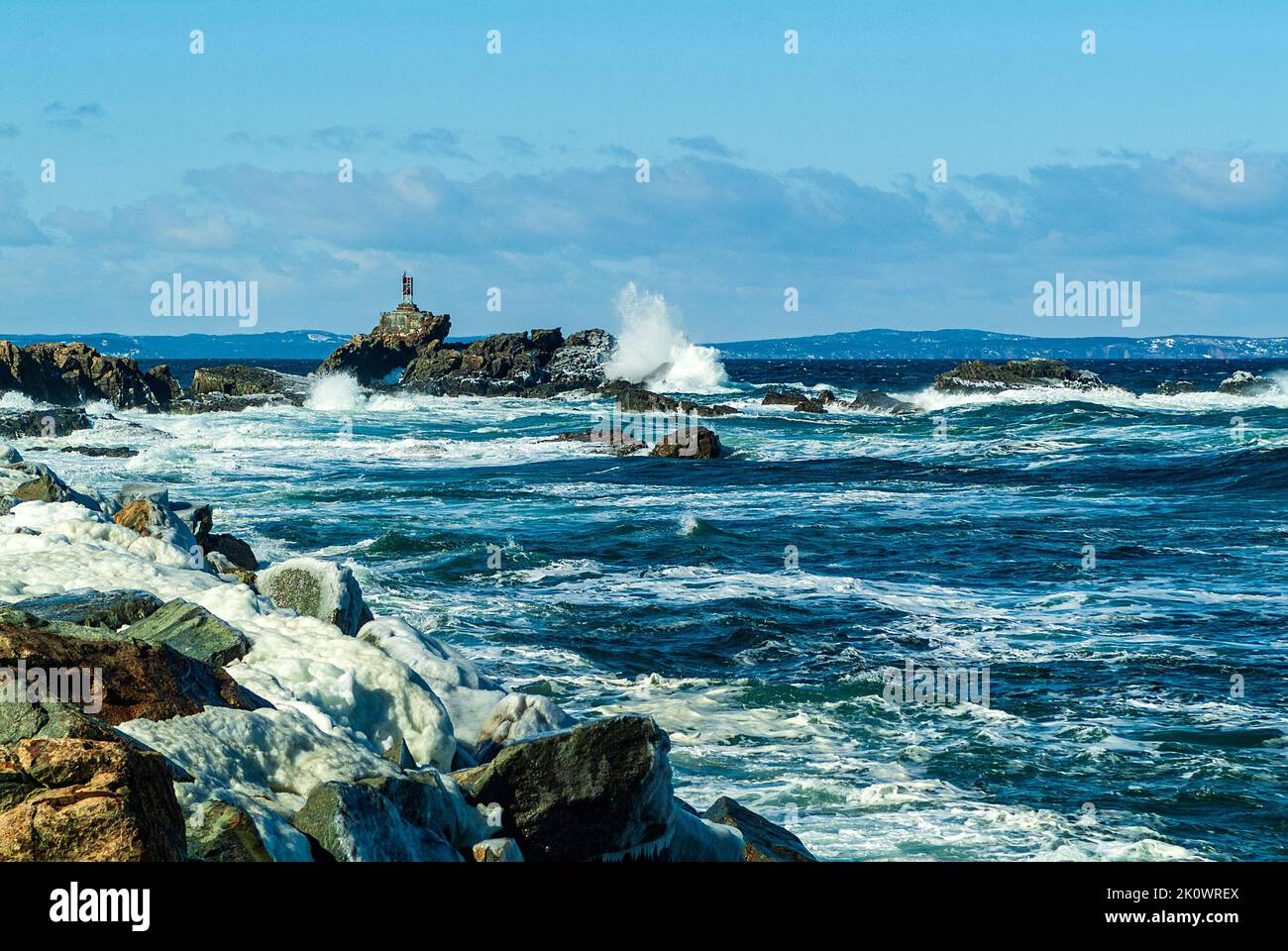 White water created as the Atlantic Ocean waves splash upon a ...