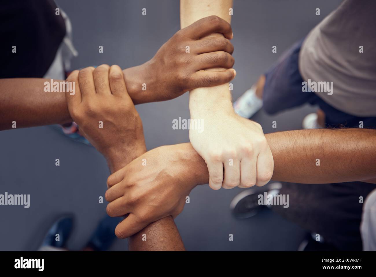 Hands, teamwork solidarity and fitness motivation for athlete winning ...