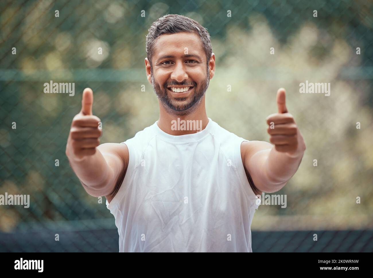 Happy yes thank you or success thumbs up of a sports man with a smile ...