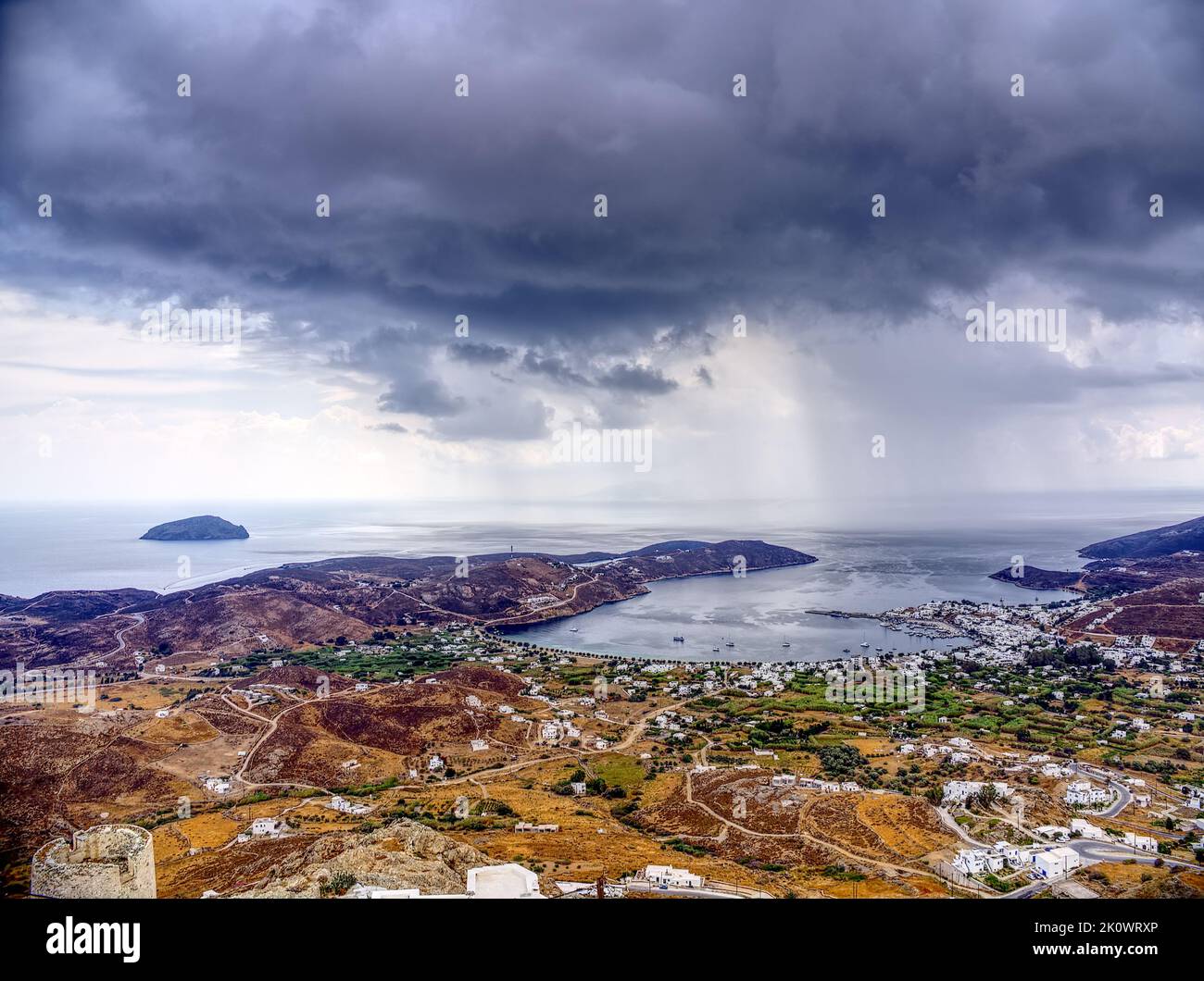 Storm over aegean island port Stock Photo - Alamy