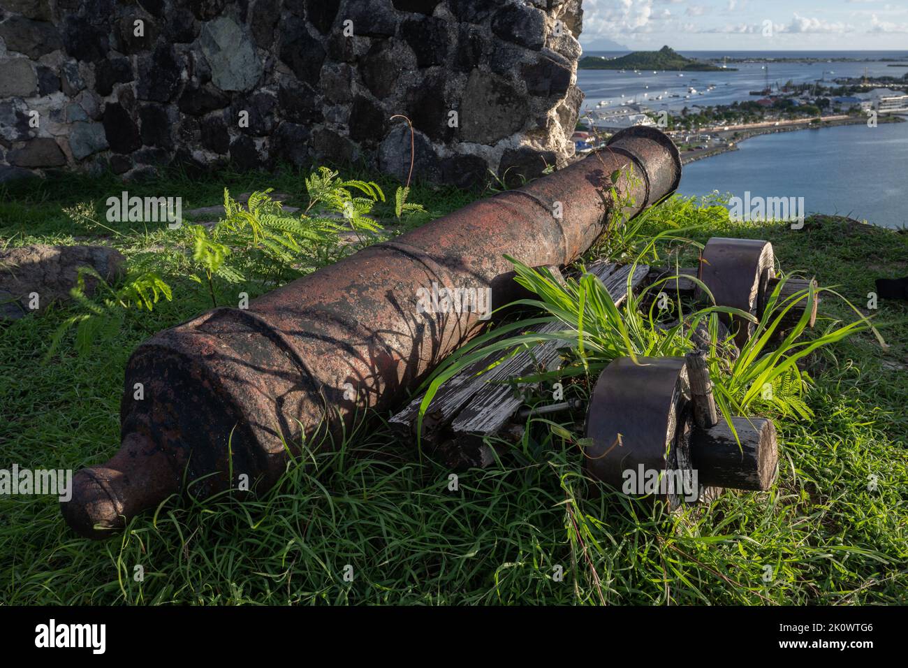 An old cannon on Fort Louis overlooks the harbour at Marigot, on the ...