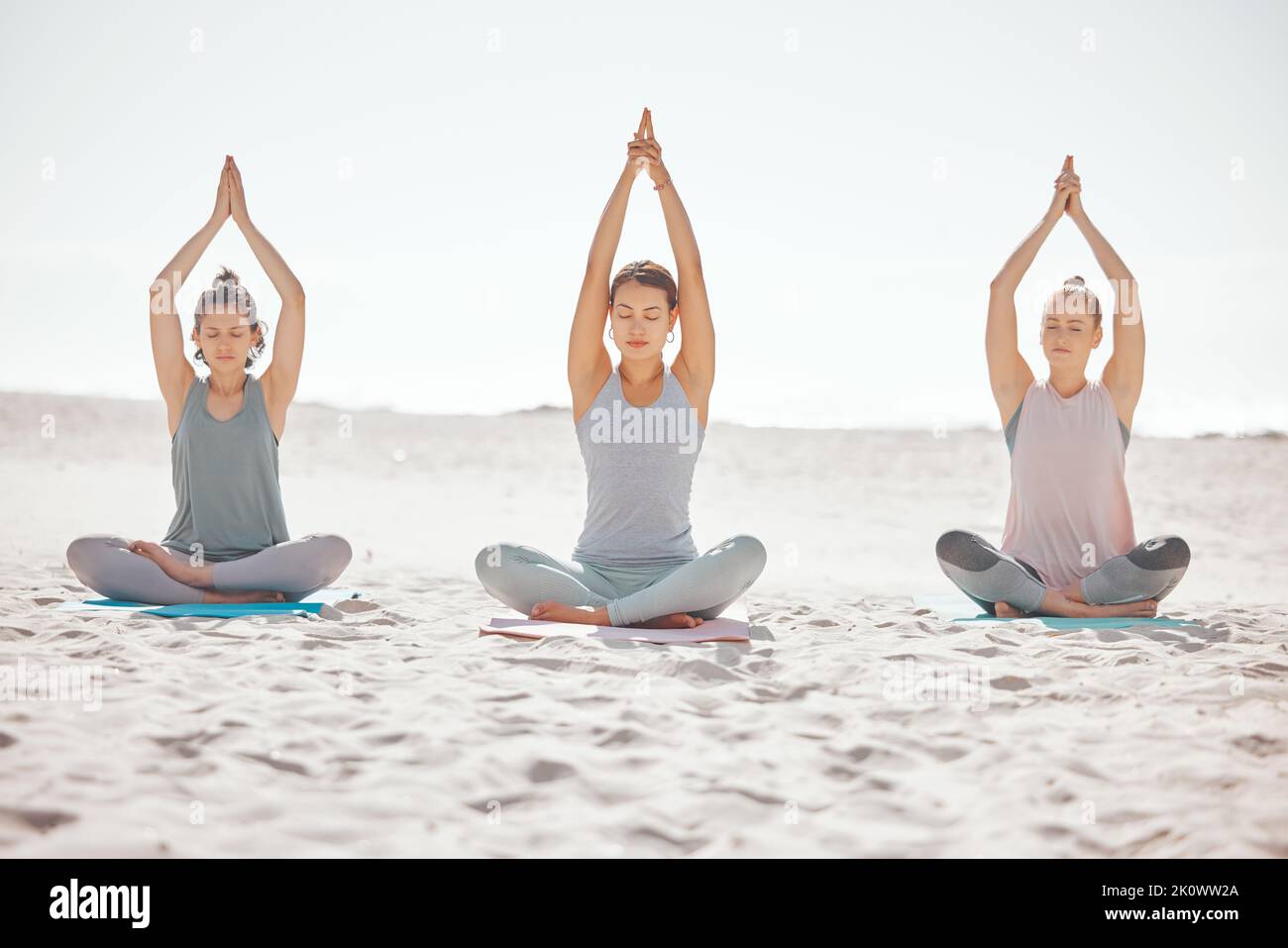 Beach yoga, fitness women and meditation, stretching and balance in ...