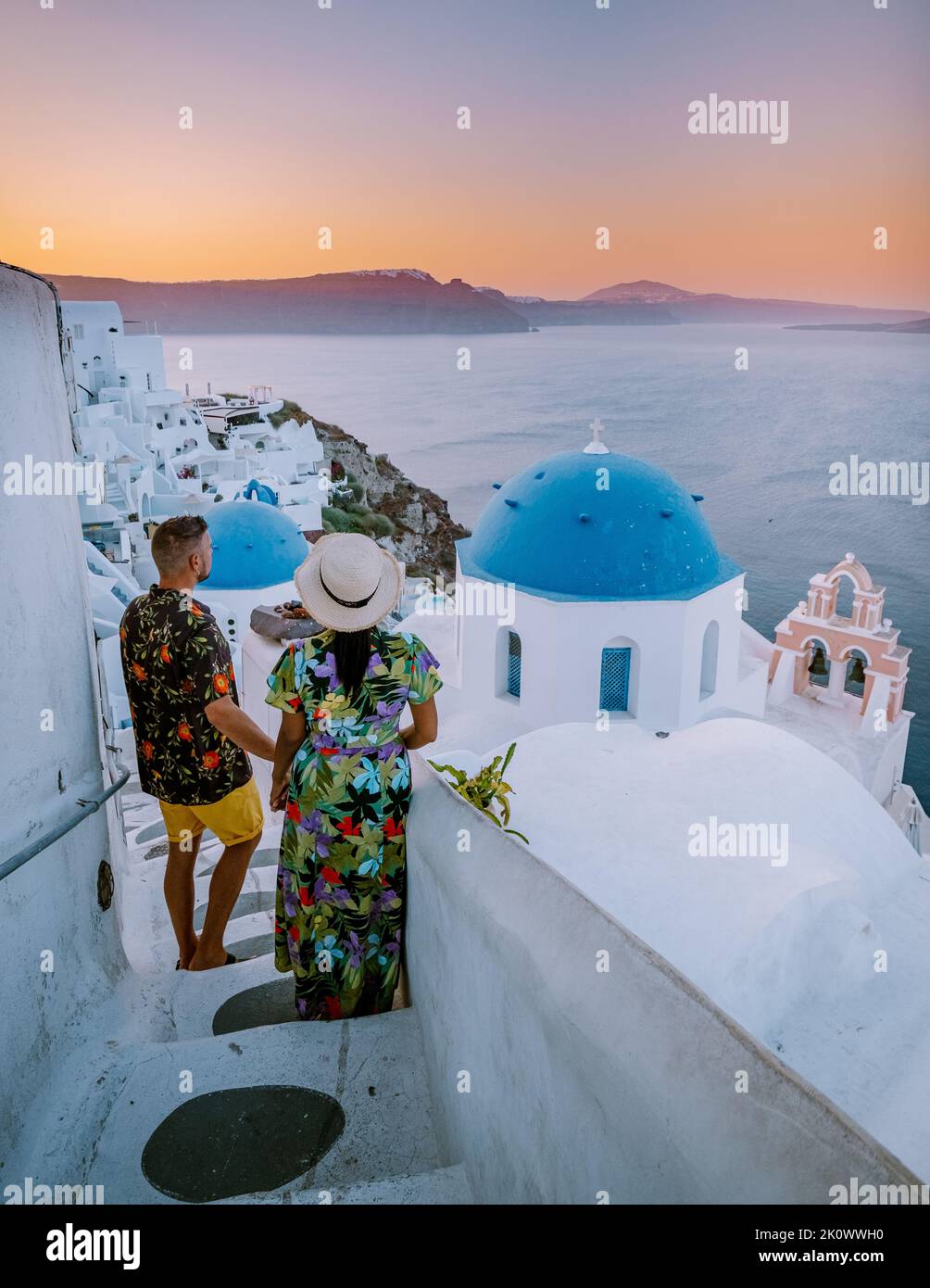 On vacation in Santorini Greece, two men and women visit Oia Santorini ...