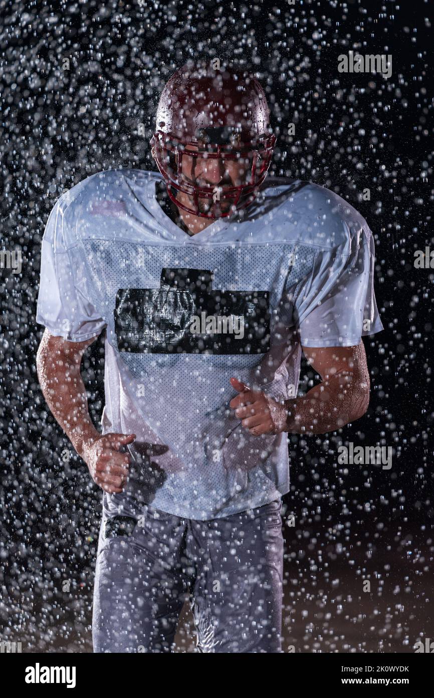 American Football Field: Lonely Athlete Warrior Standing on a Field ...