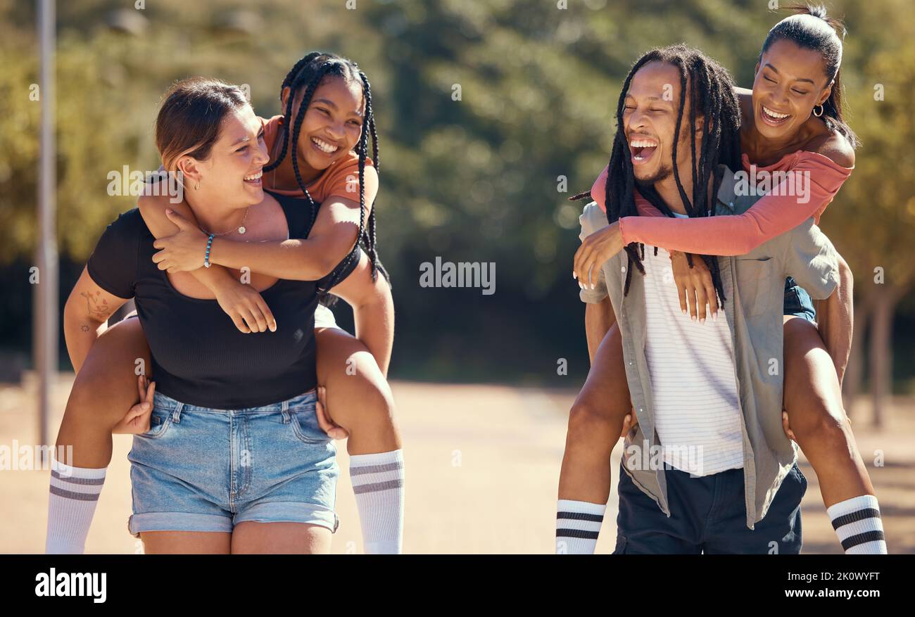 Friends, running and happy park group doing a piggy back race in nature ...