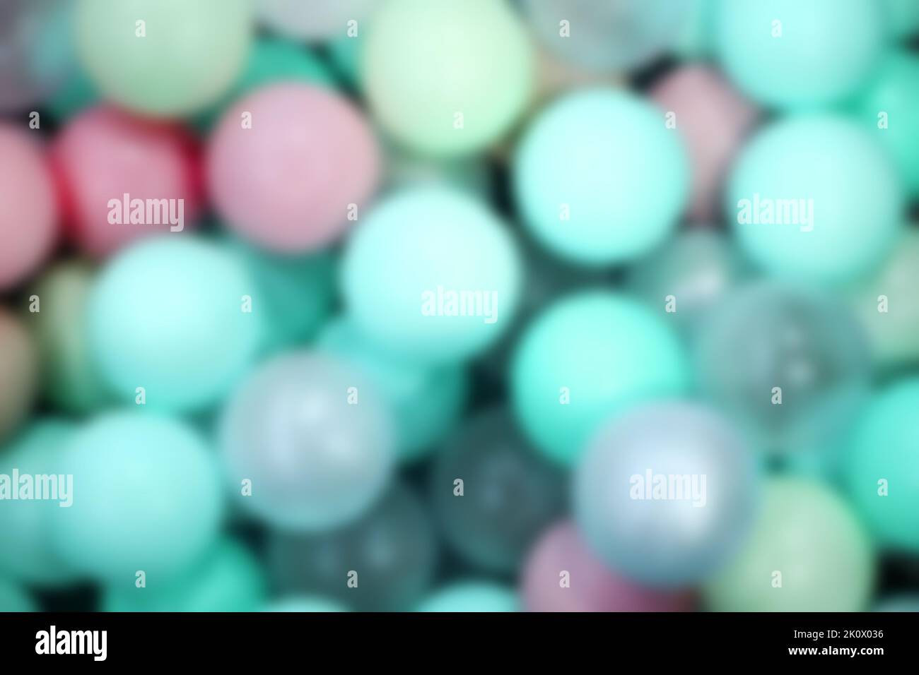 Blurred blue balls, balloons and toys background. Abstract colorful ...