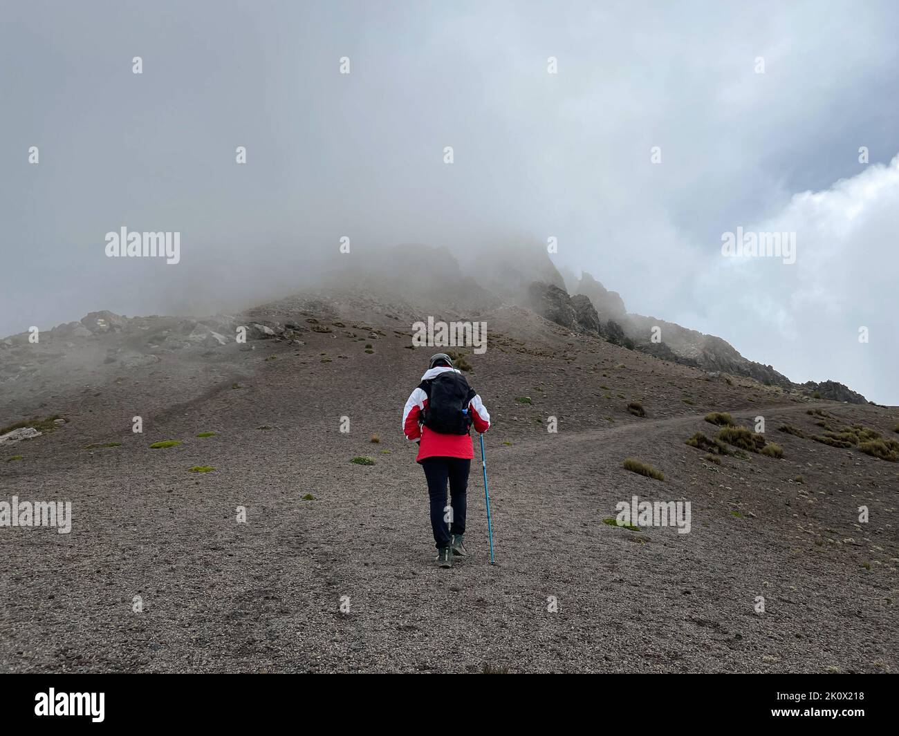 Climber in the Nevado de Colima Volcano National Park, located in ...