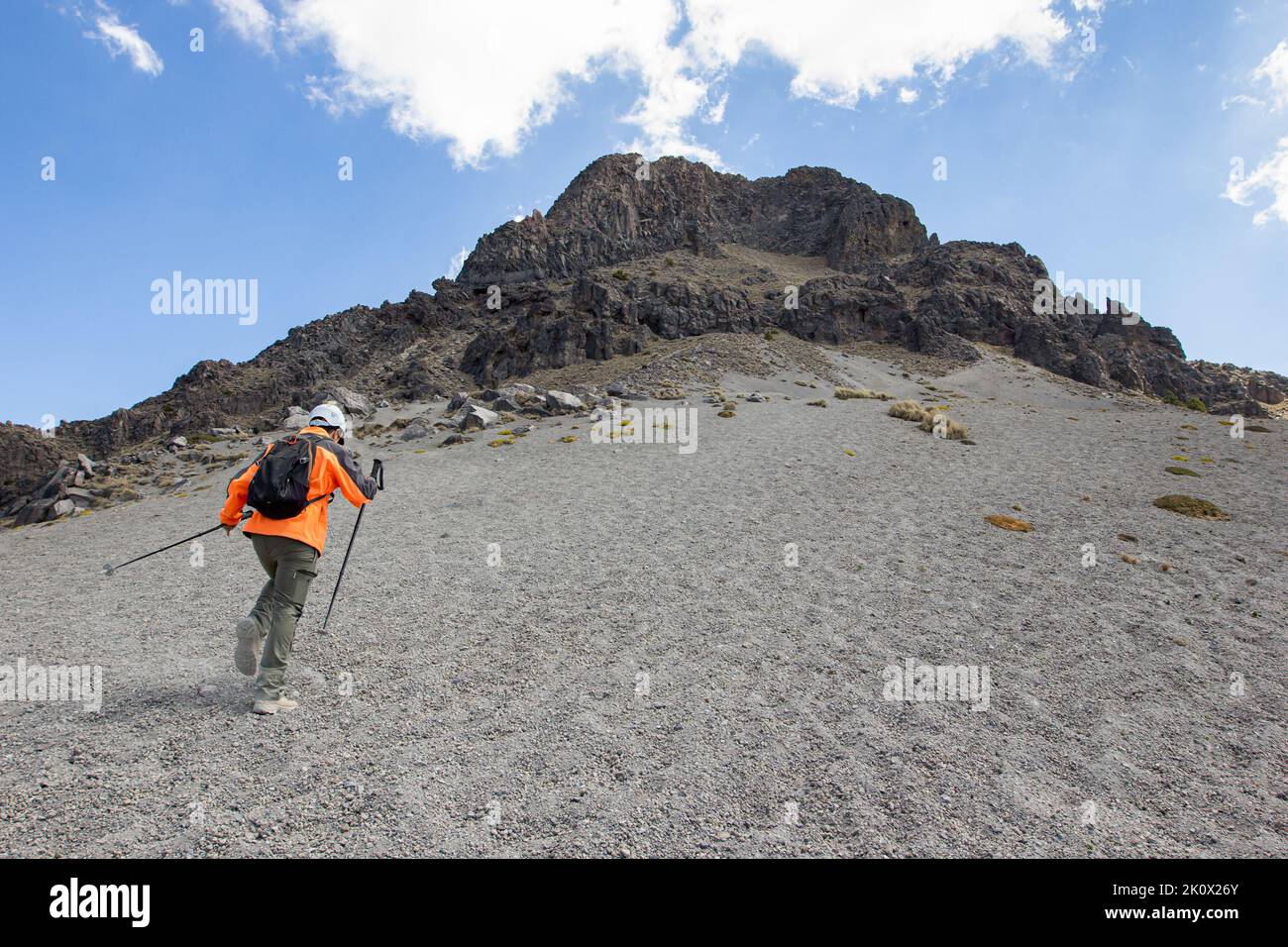 Climber in the Nevado de Colima Volcano National Park, located in ...