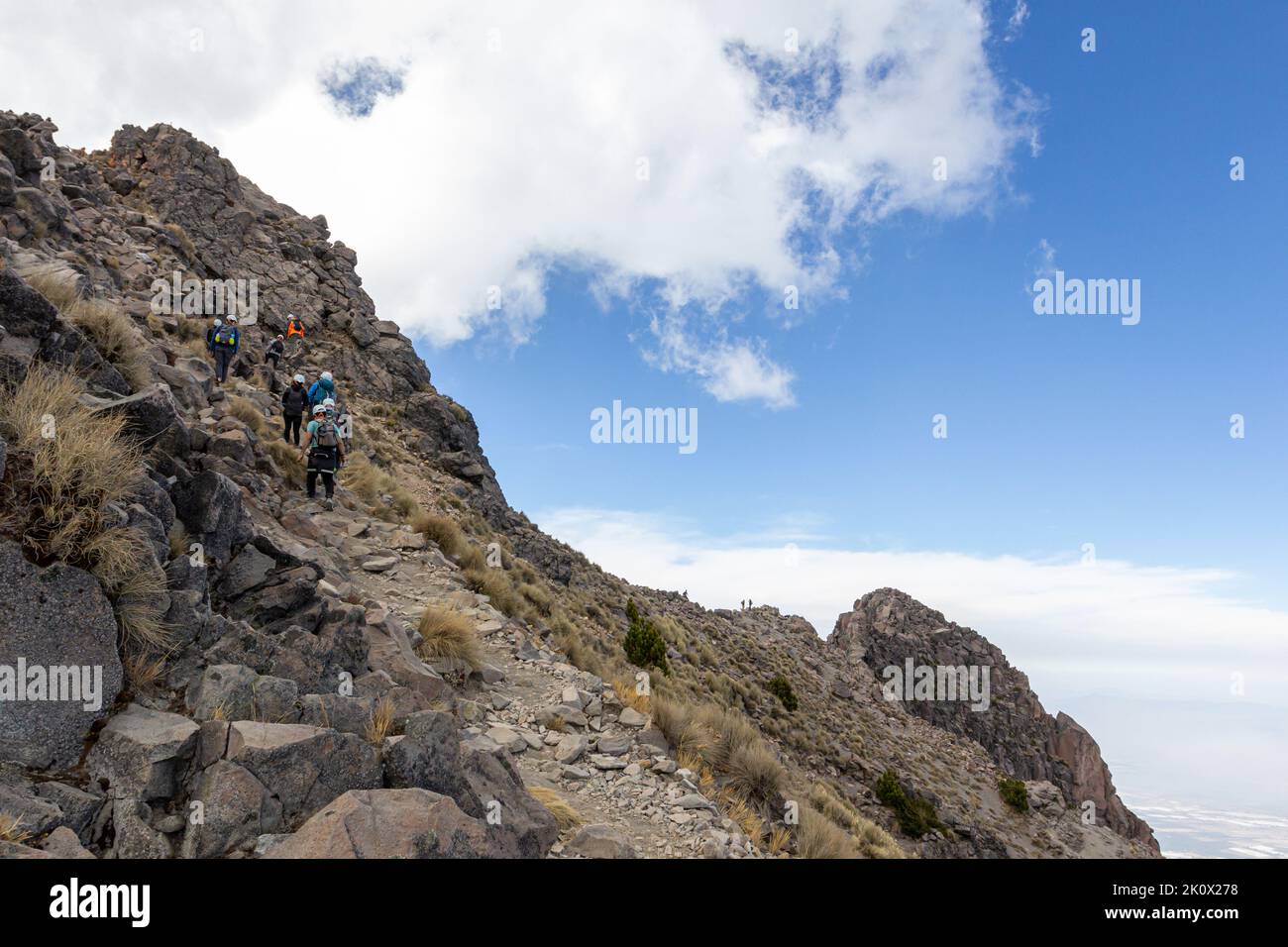 Climbers in the Nevado de Colima Volcano National Park, located in ...