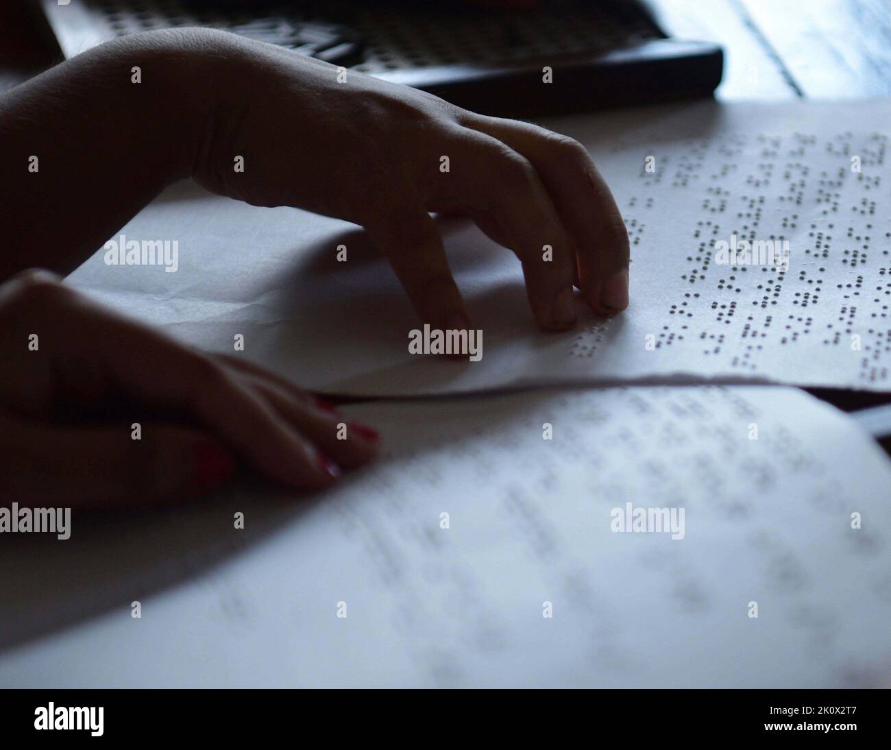 Visually impaired students studying during a special class on the eve ...