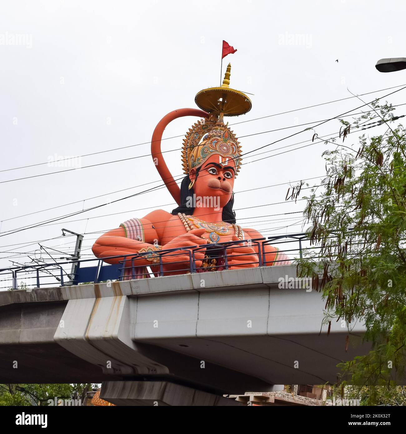 Big statue of Lord Hanuman near the delhi metro bridge situated near ...