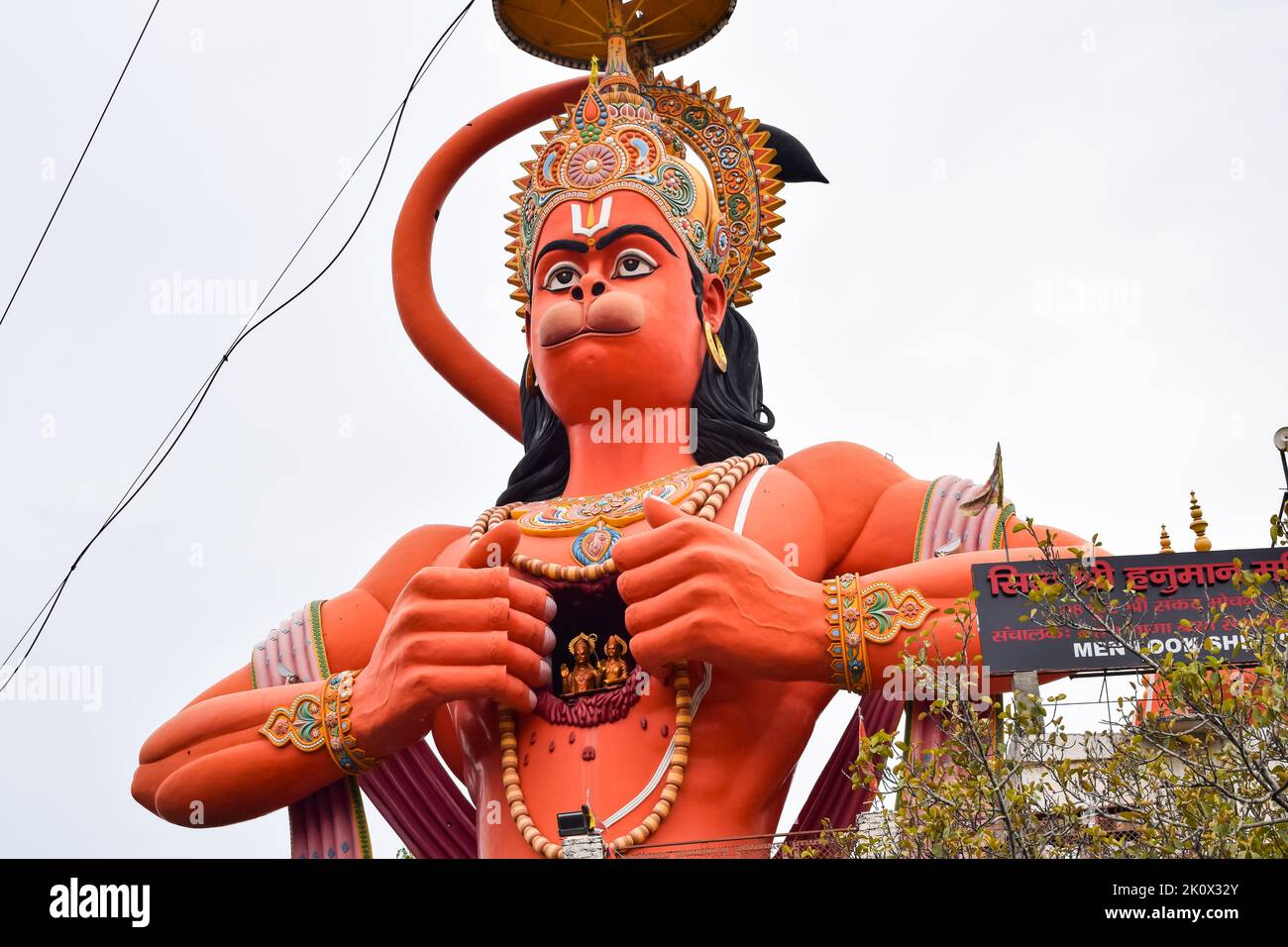 Big statue of Lord Hanuman near the delhi metro bridge situated near ...
