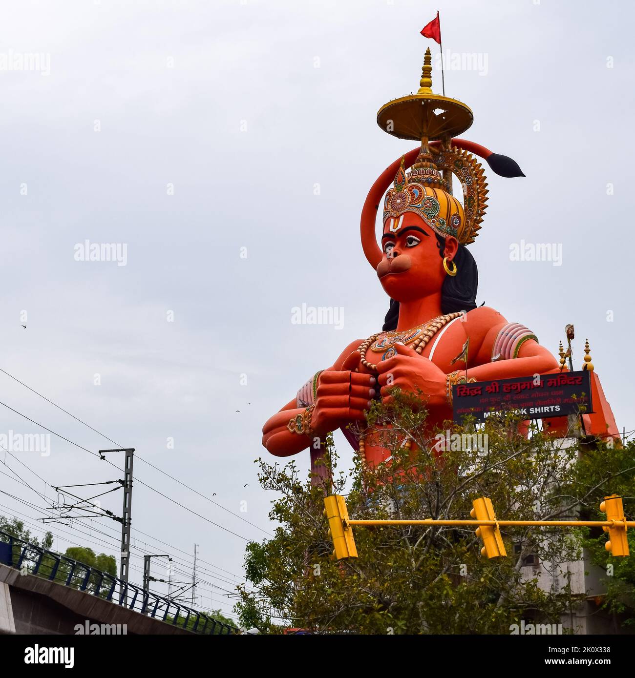 Big statue of Lord Hanuman near the delhi metro bridge situated near ...