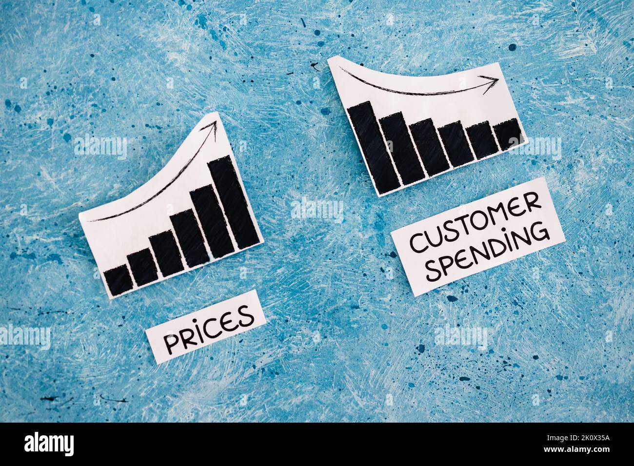 prices going up and consumer spending going down conceptual image ...