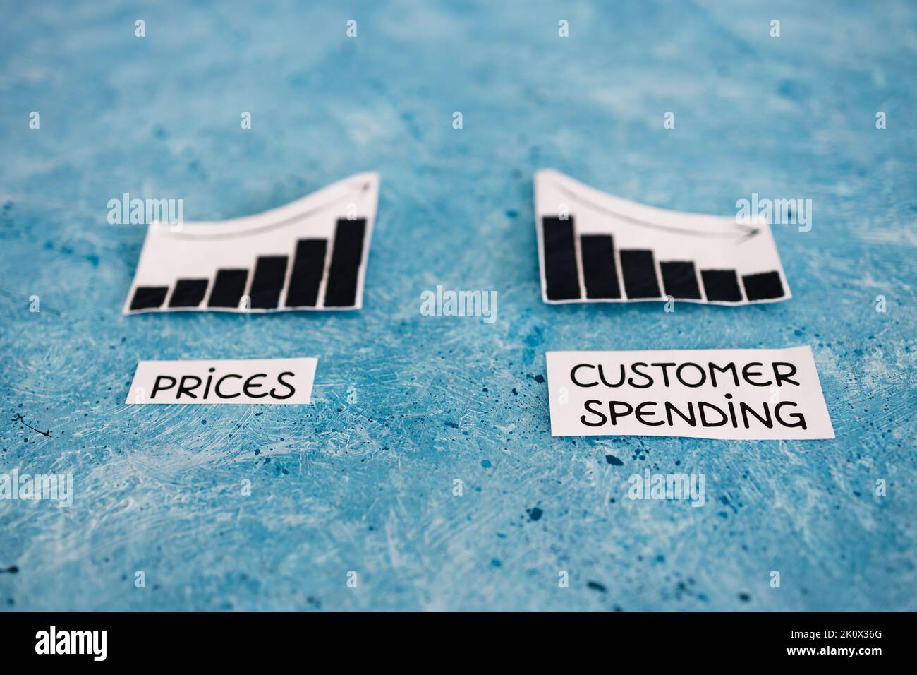 prices going up and consumer spending going down conceptual image ...