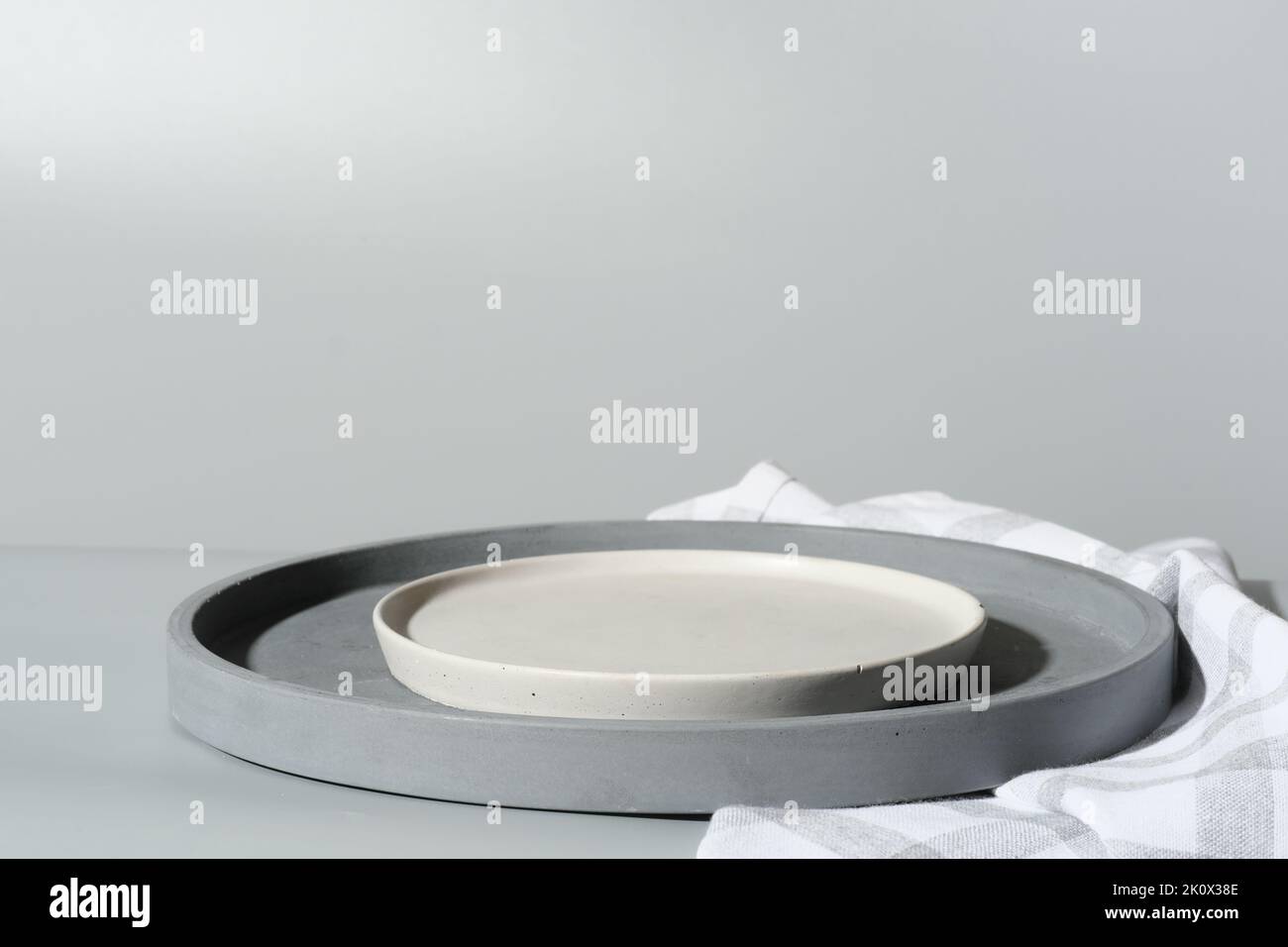 front view of classic minimal table set of two empty plates for food ...