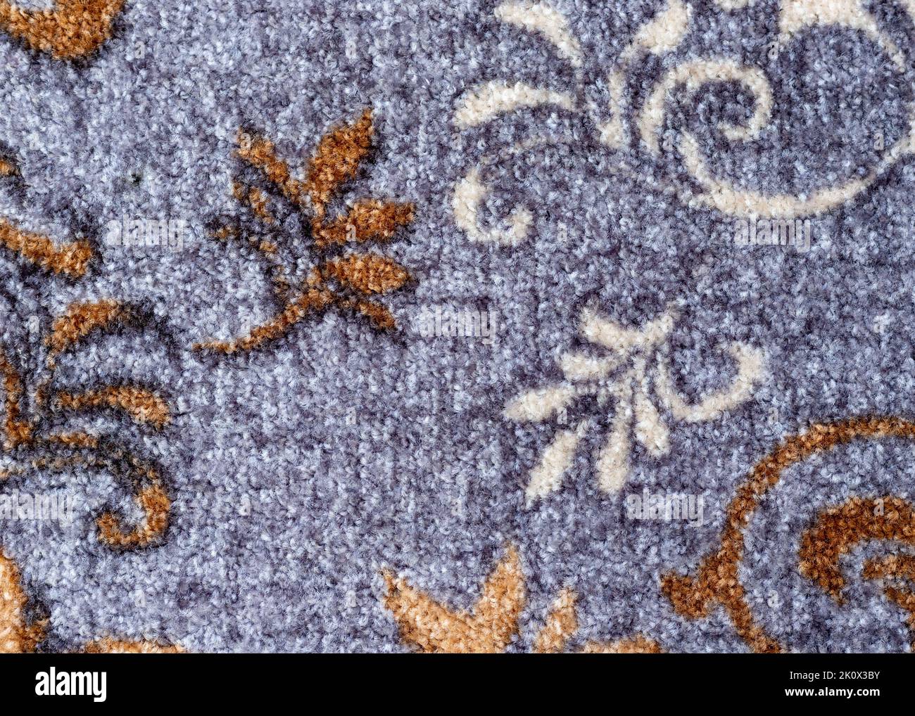 Gray color carpet with beautiful design texture background closeup view ...