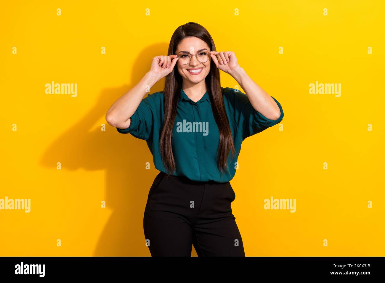 Photo of young cheerful pretty woman hands touch eyeglasses smart ...