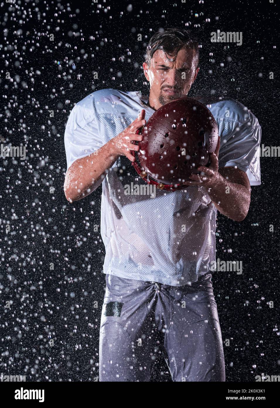 American Football Field: Lonely Athlete Warrior Standing on a Field ...