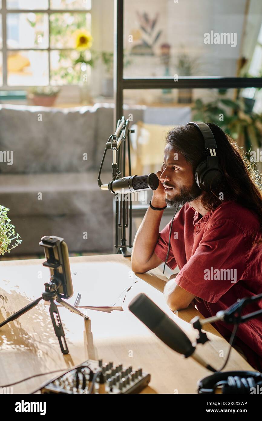 Indian male blogger recording video hi-res stock photography and images ...