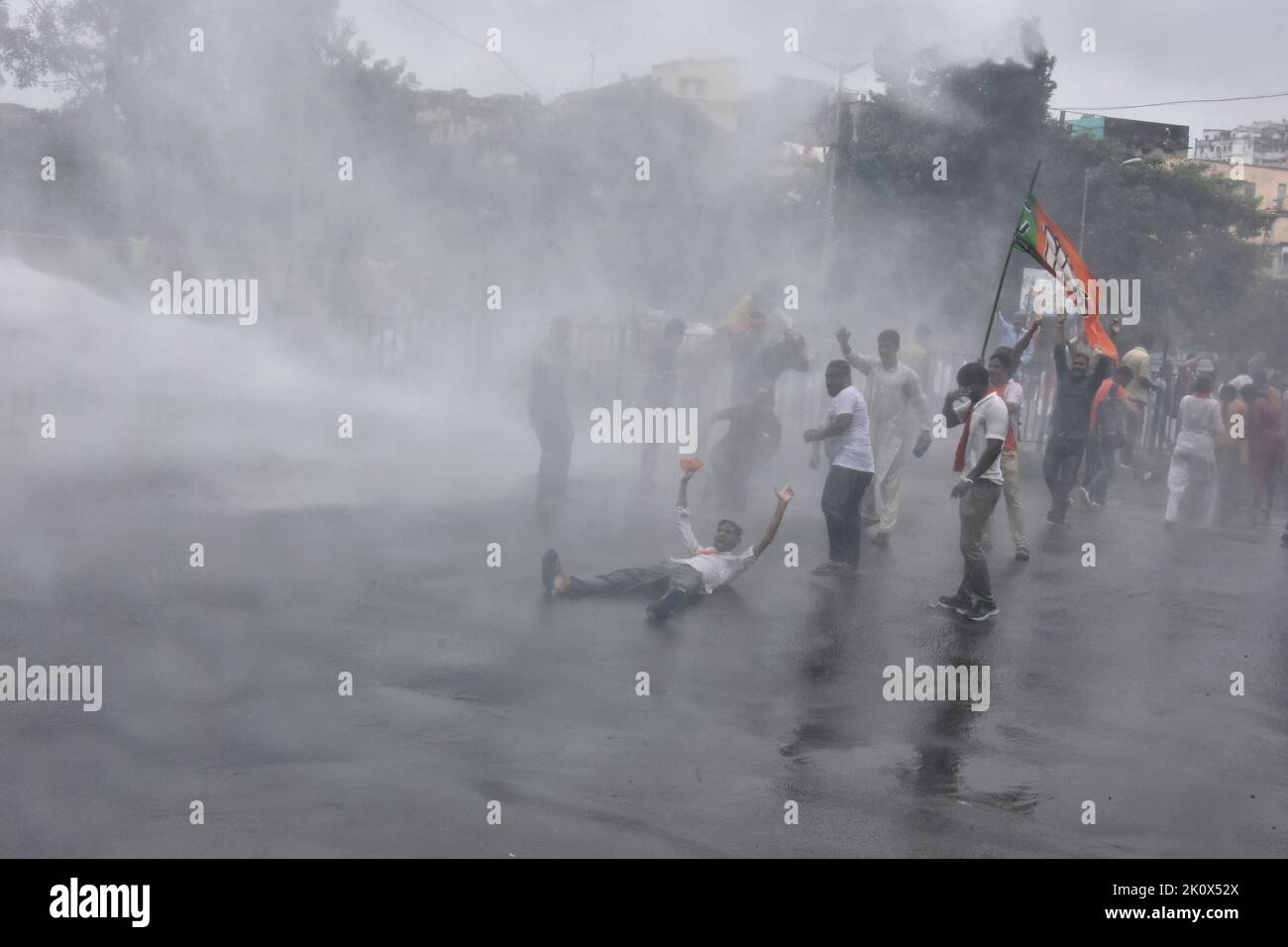 Security personnel use water cannons to disperse BJP supporters from ...