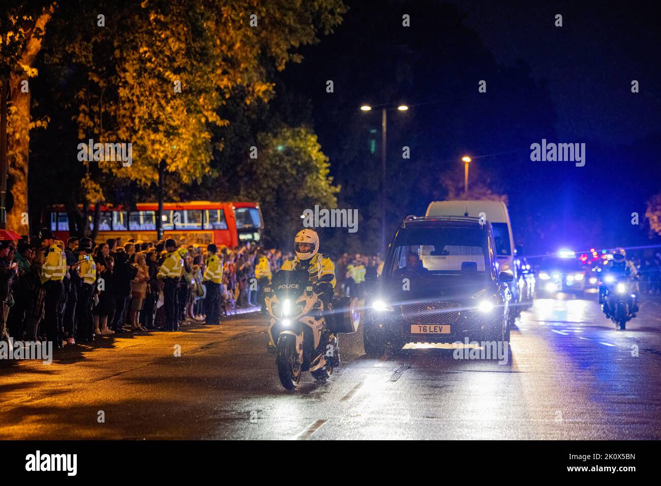 A spare vehicle for the state hearse of Queen Elizabeth II passes ...