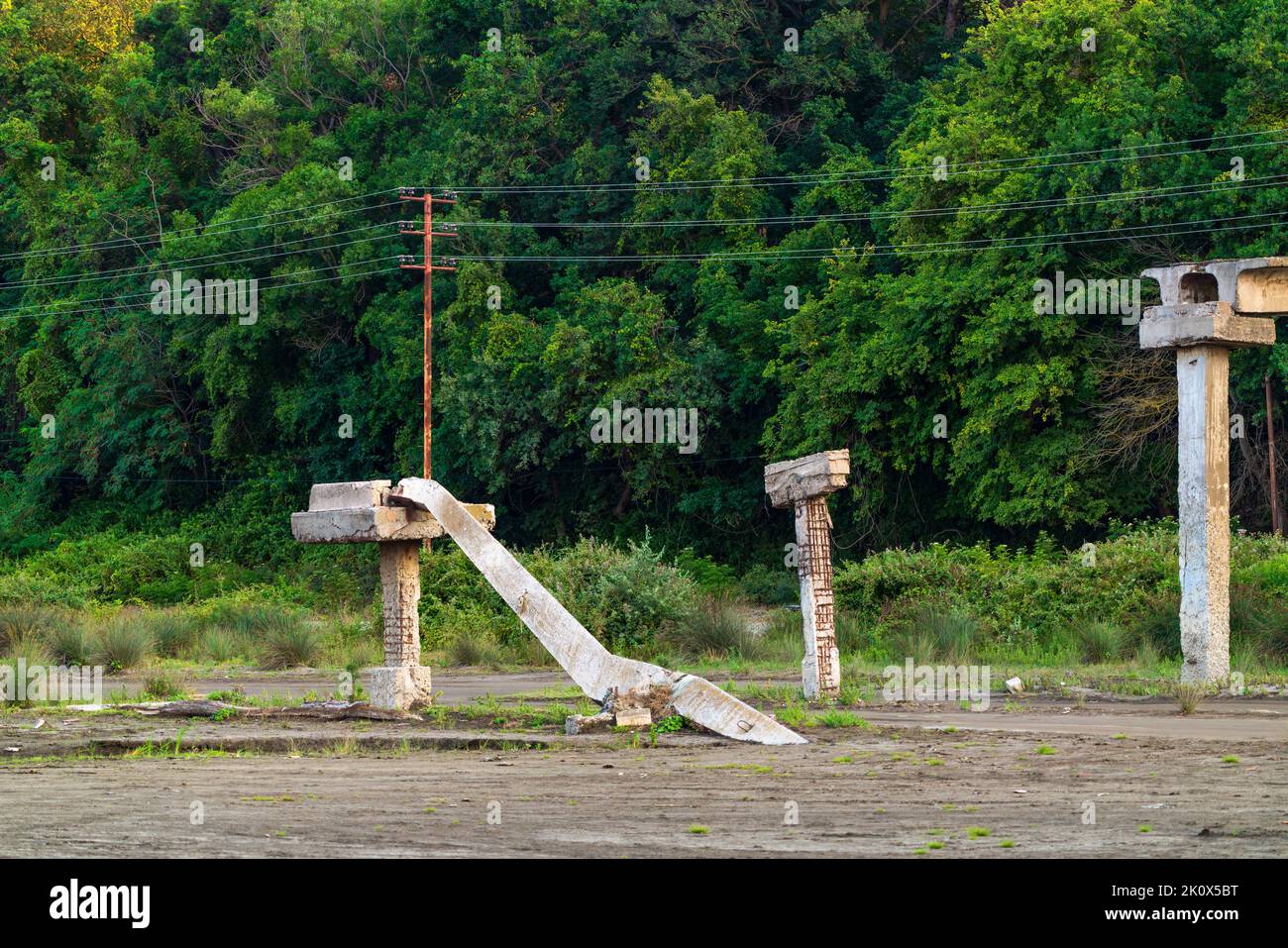 Remains of an old stone bridge on the beach Stock Photo - Alamy
