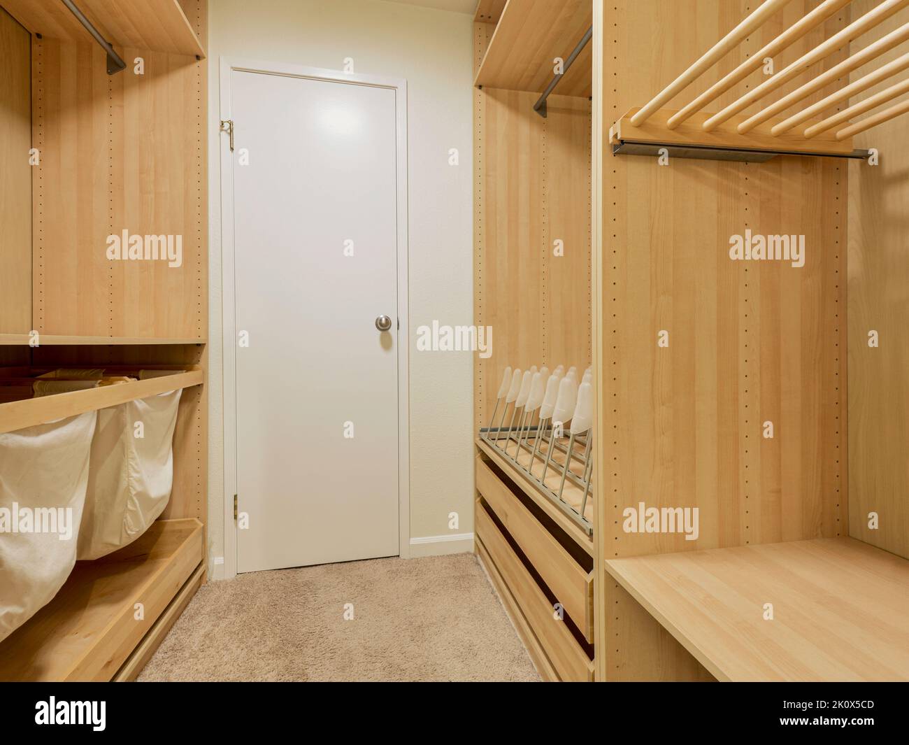 Modern residential bedroom closet interior Stock Photo - Alamy