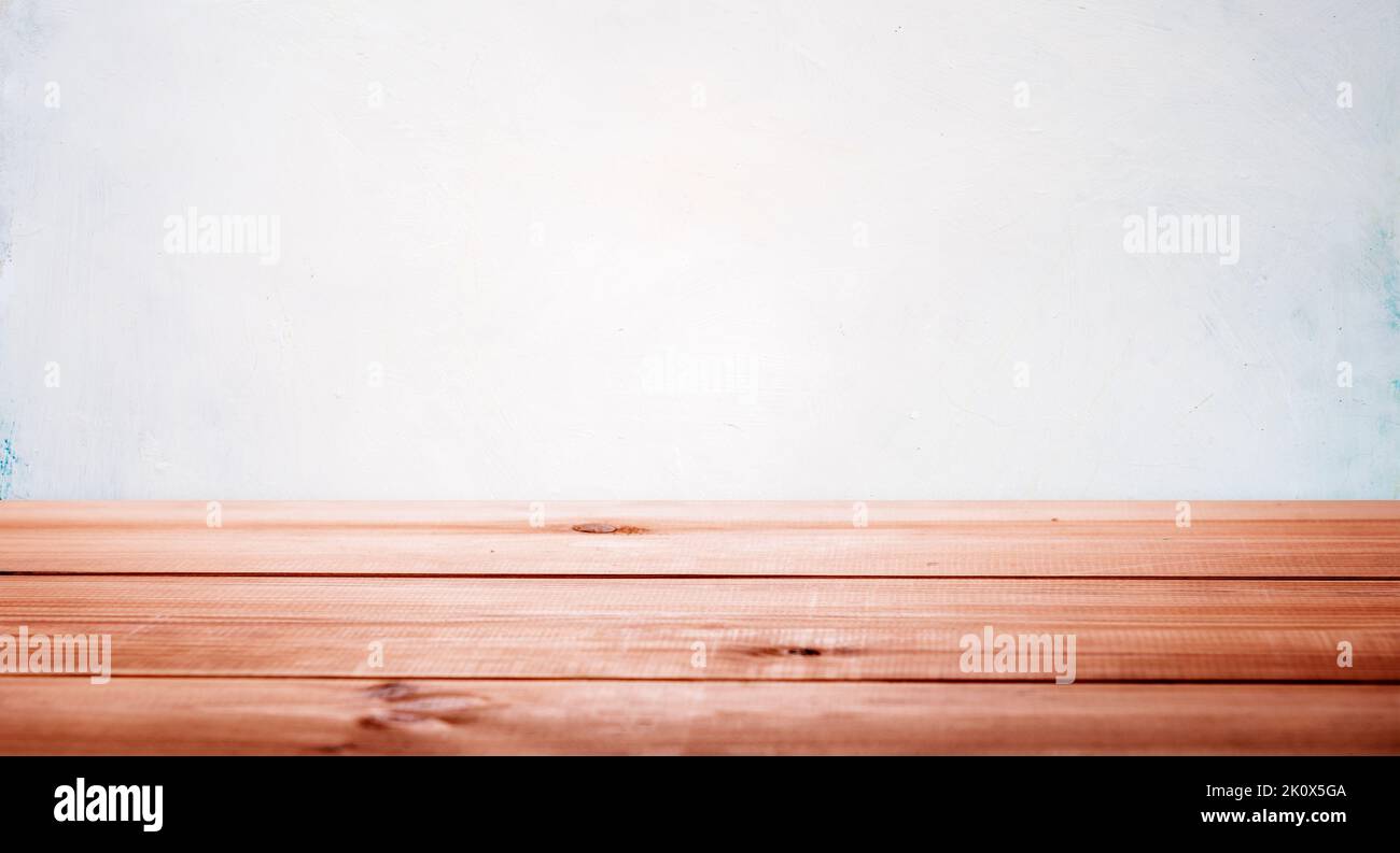 Wood table and white empty wall in home interior for product placement ...