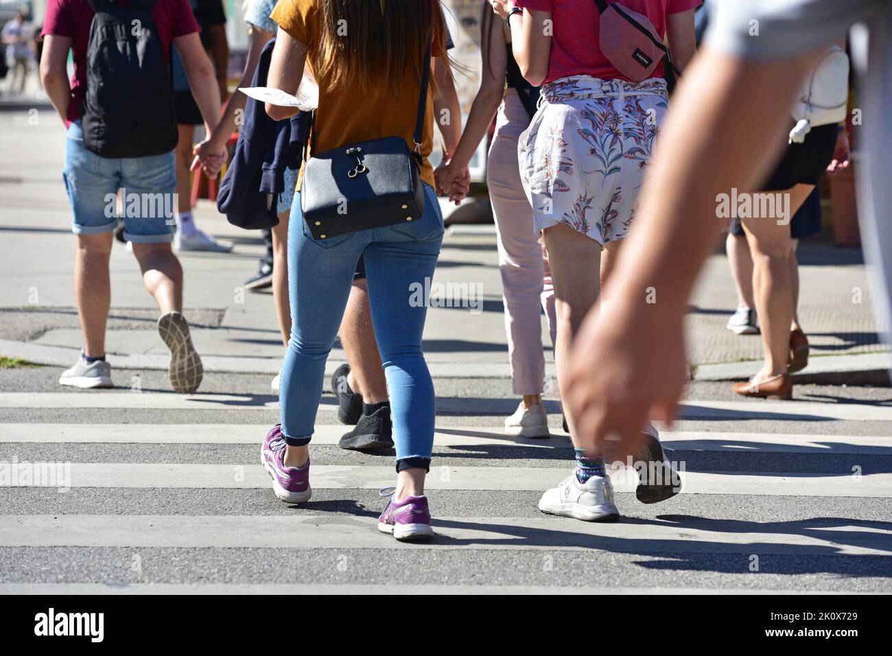 Street scene in downtown Vienna with many people from behind Stock ...