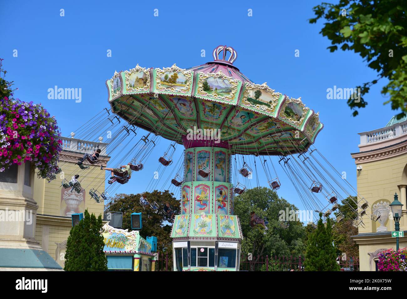 A carousel at the entrance to the Prater amusement park in Vienna Stock ...