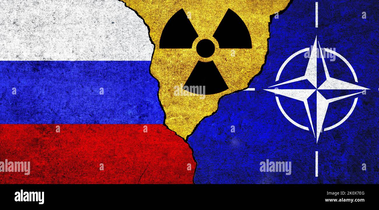 Flags of NATO, Russia and radiation symbol together. Russia and NATO ...