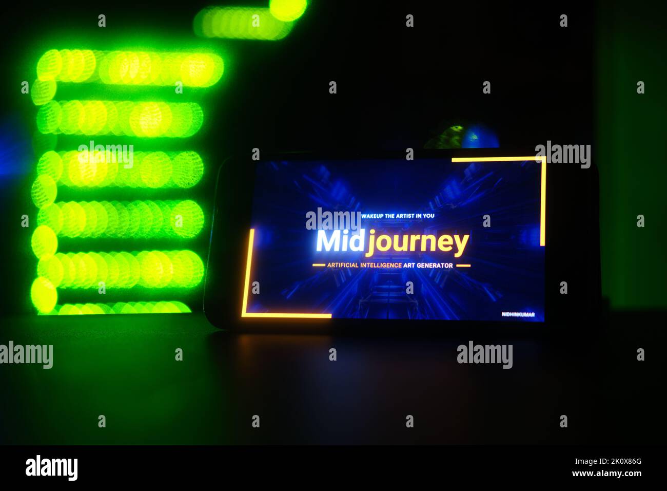 AI Midjourney logo on the phone screen on the background of the server ...