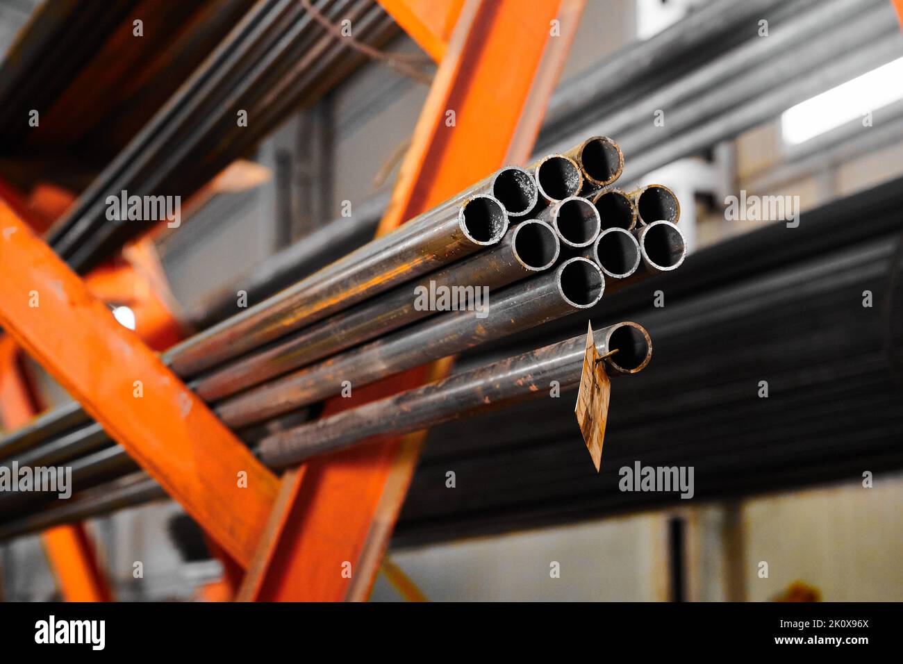 Stack of cold rolled tubes in industrial complex storage Stock Photo ...
