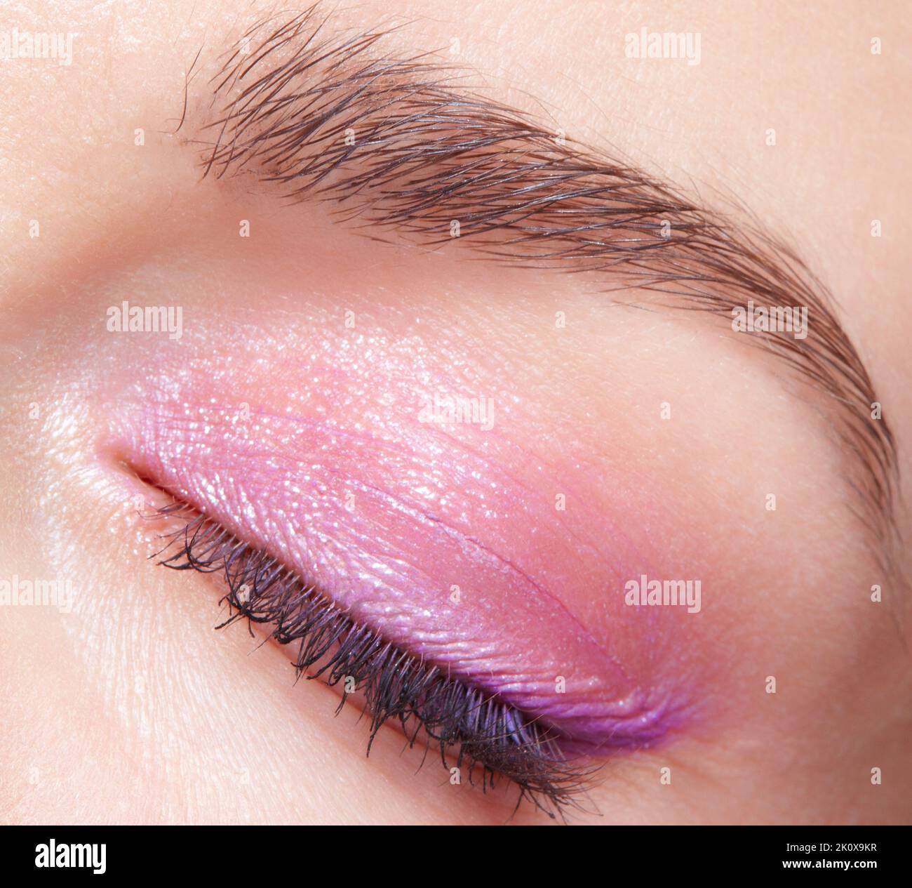 Closeup macro shot of closed human female eye. Woman with natural ...