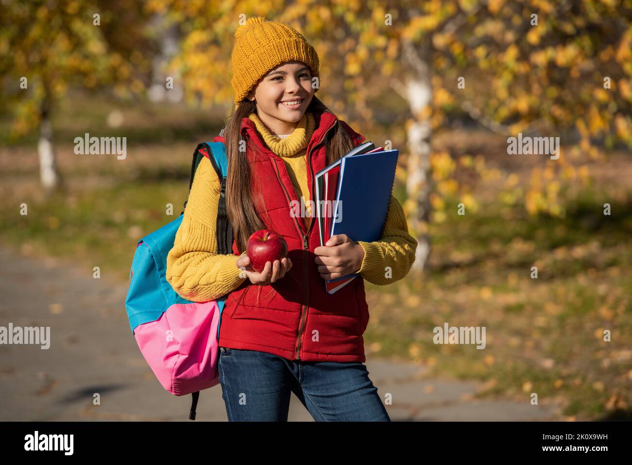 happy teen girl back to high school in autumn Stock Photo - Alamy