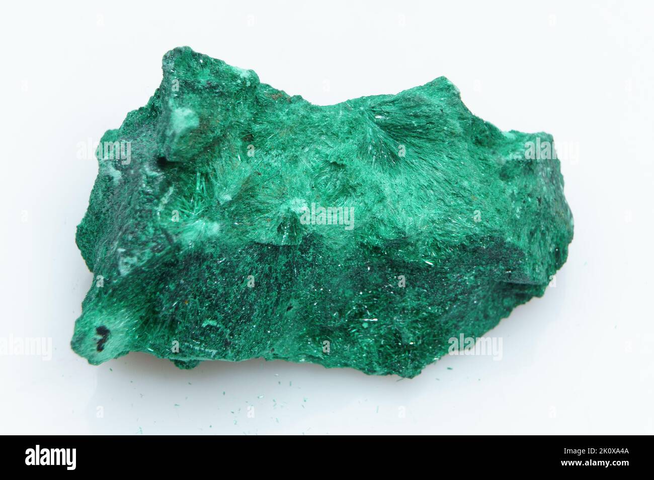 Natural gemstone green malachite on white background Stock Photo - Alamy