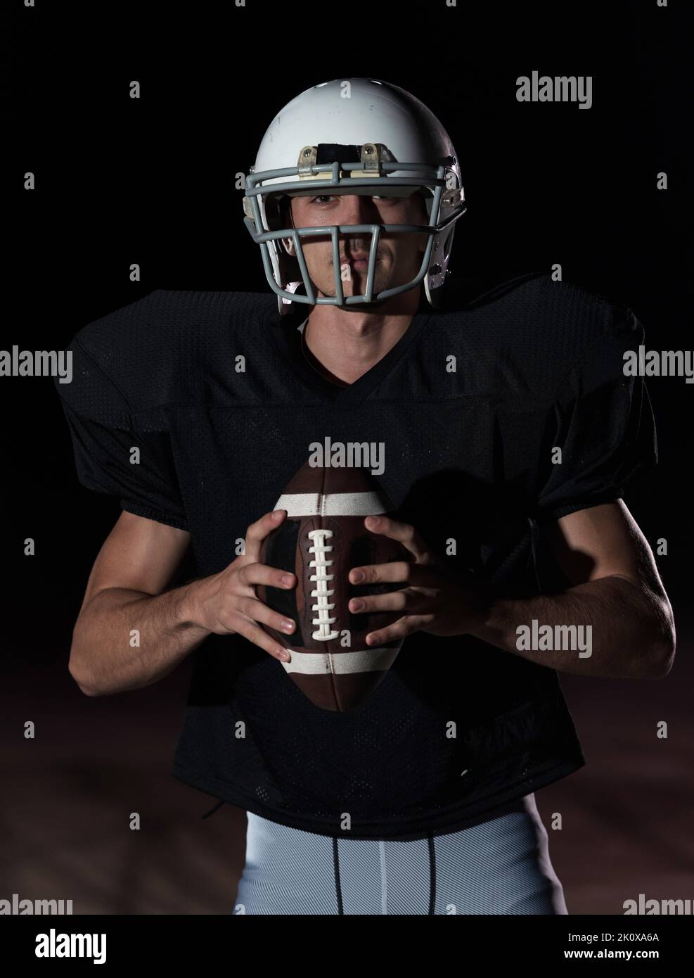 American Football Field: Lonely Athlete Warrior Standing on a Field ...