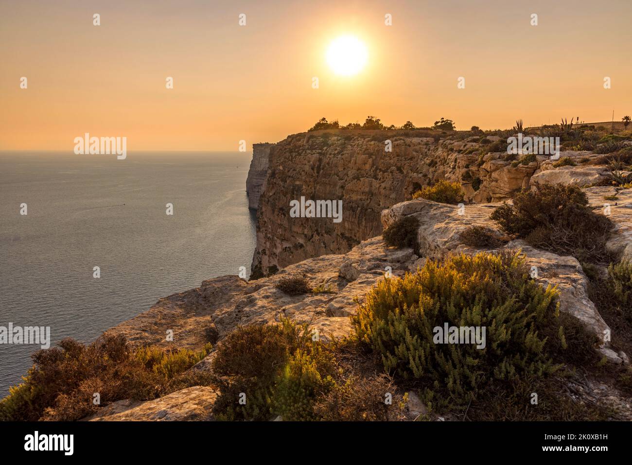 Sunrise over cliffs in hi-res stock photography and images - Alamy