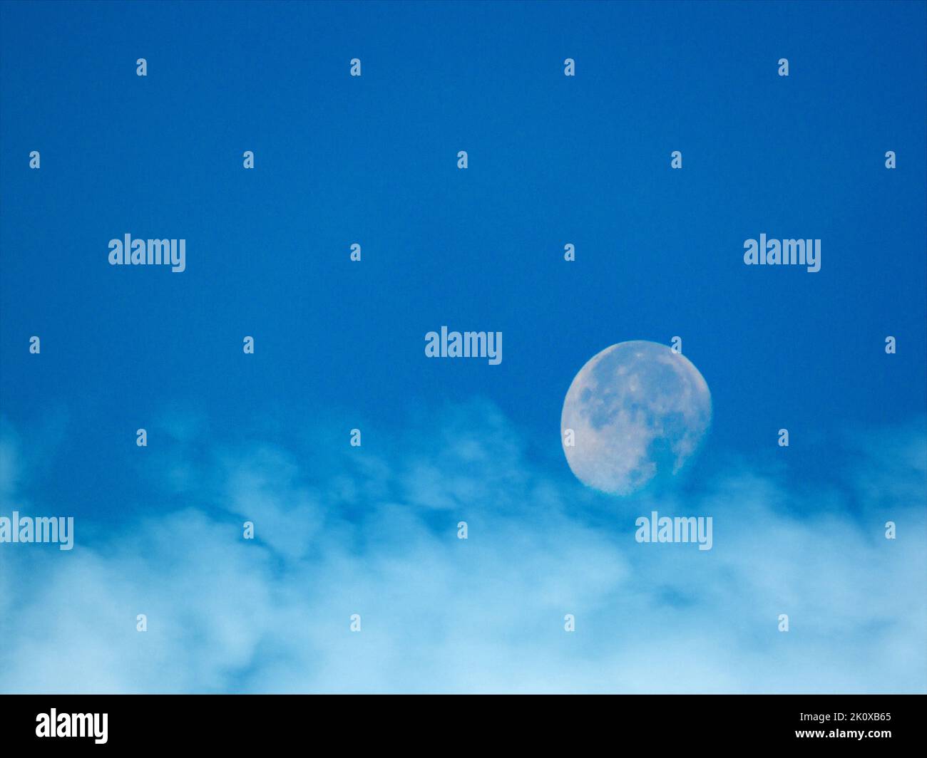 Blue morning sky with isolated white clouds hi-res stock photography ...