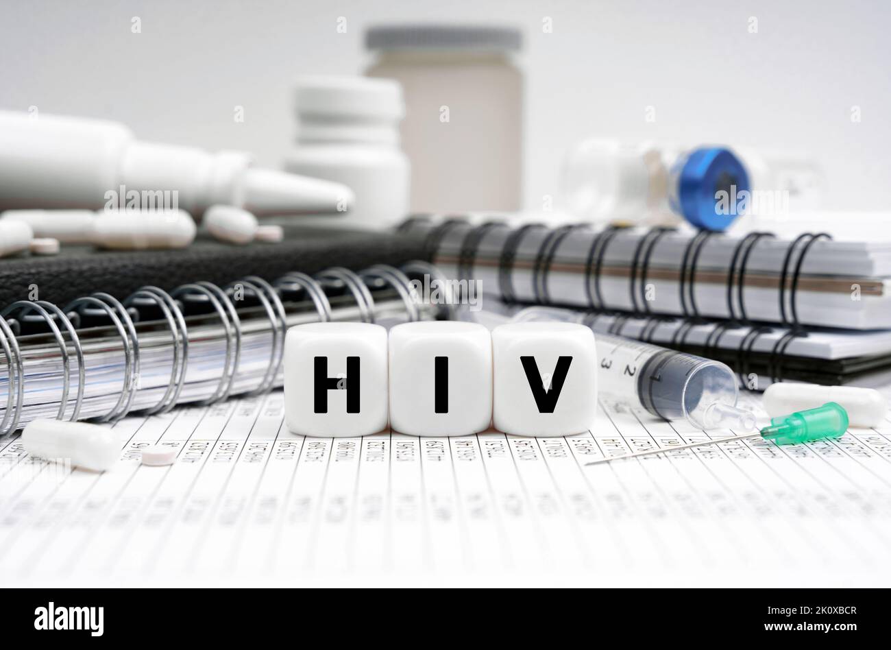 Medicine concept. On the table are diaries, medicines and cubes with ...