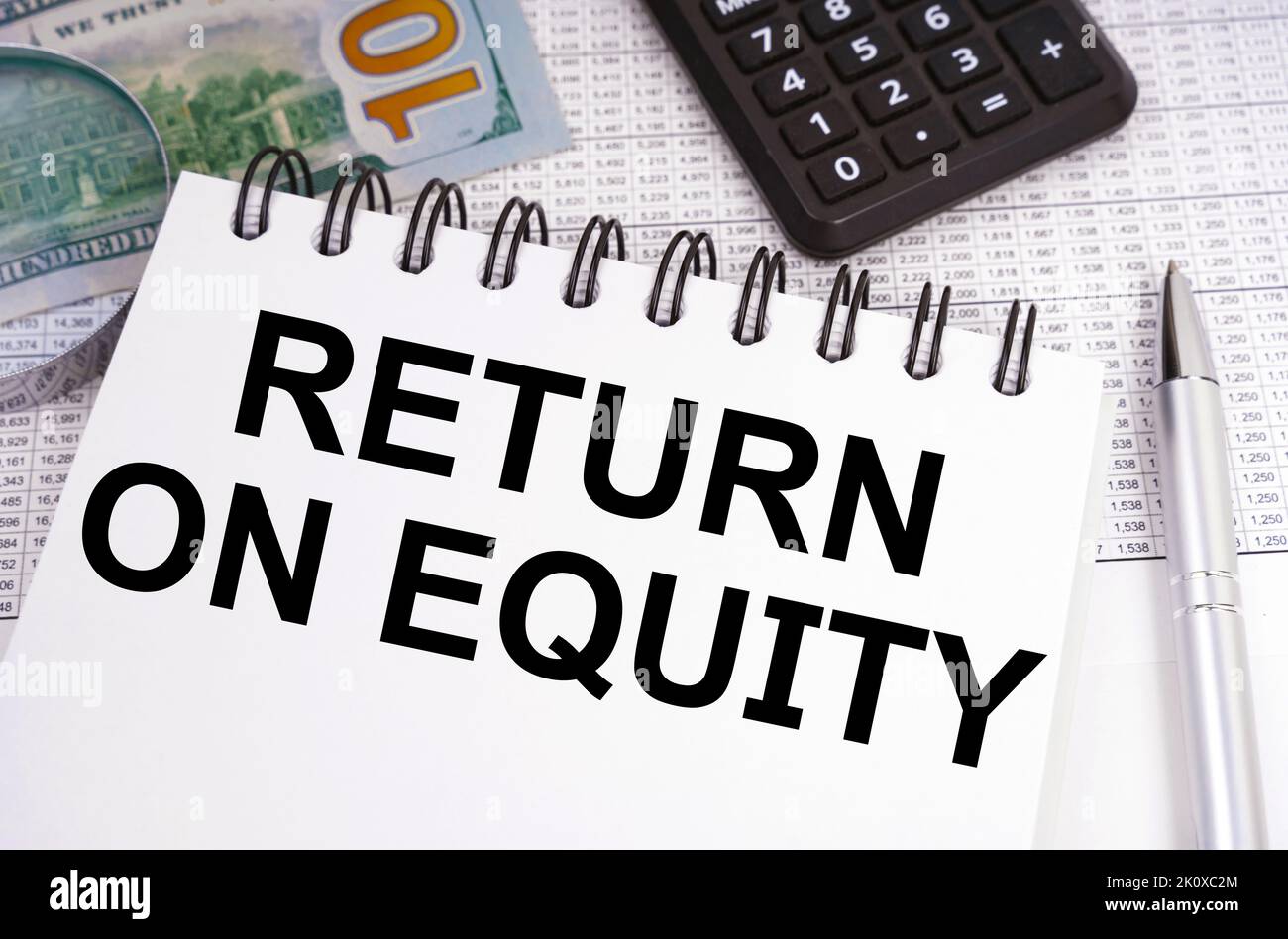 Business and finance concept. On the table there is money, a calculator ...