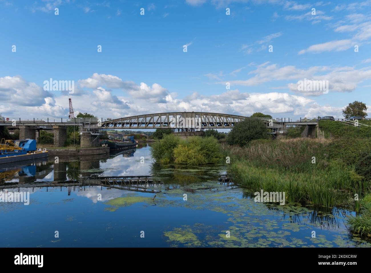A bridge at Sharpness Docks and clouds recflected on the water Stock ...